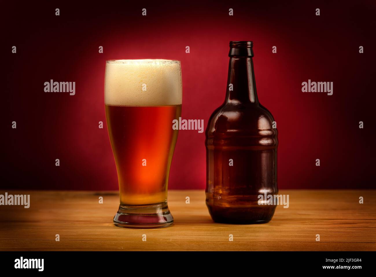 Glass Of Beer And A Bottle On A Wooden Table And Dark Red Background Craft Beer Of Local