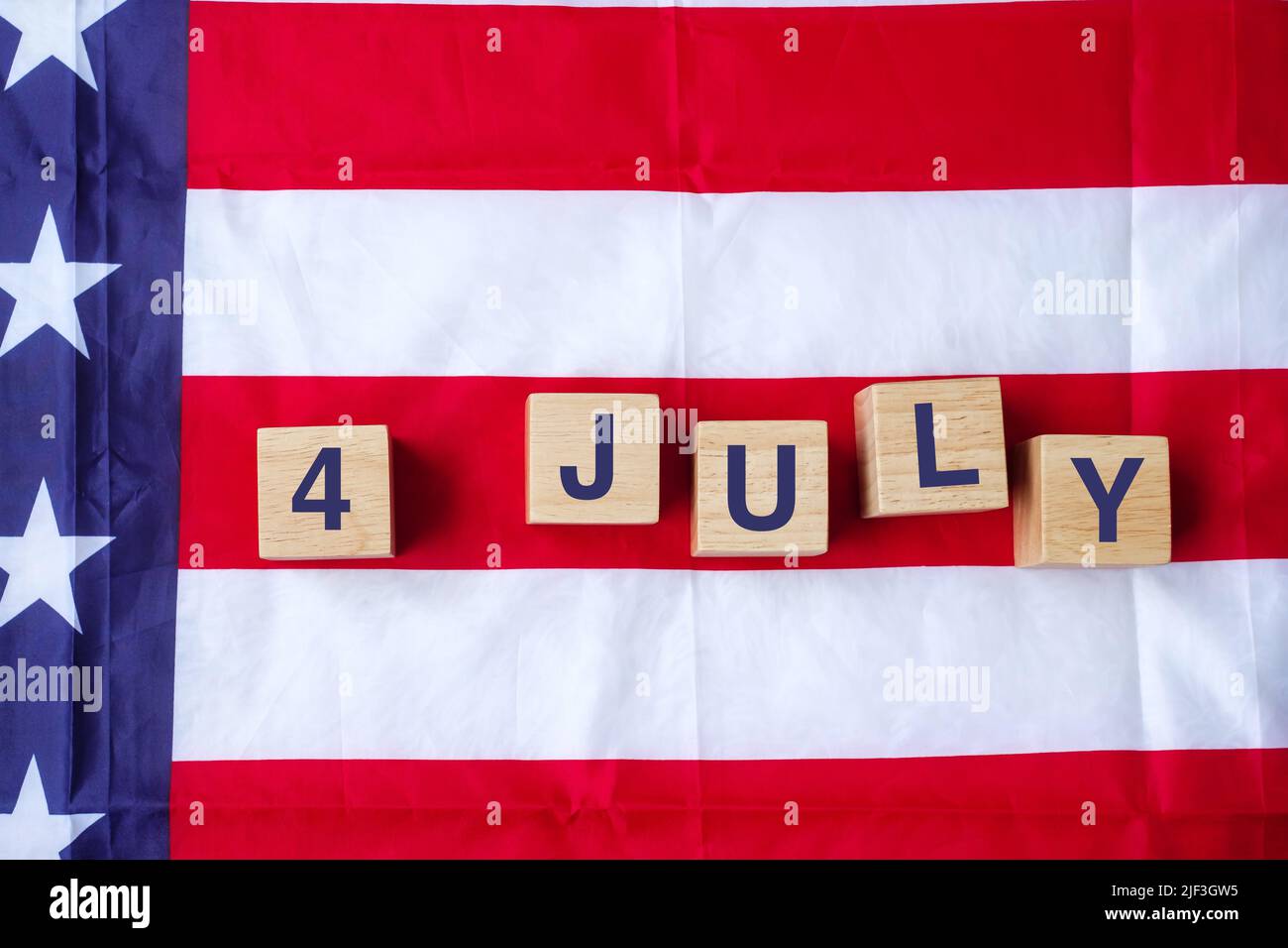 Fourth of July text on United States of America flag background. USA ...