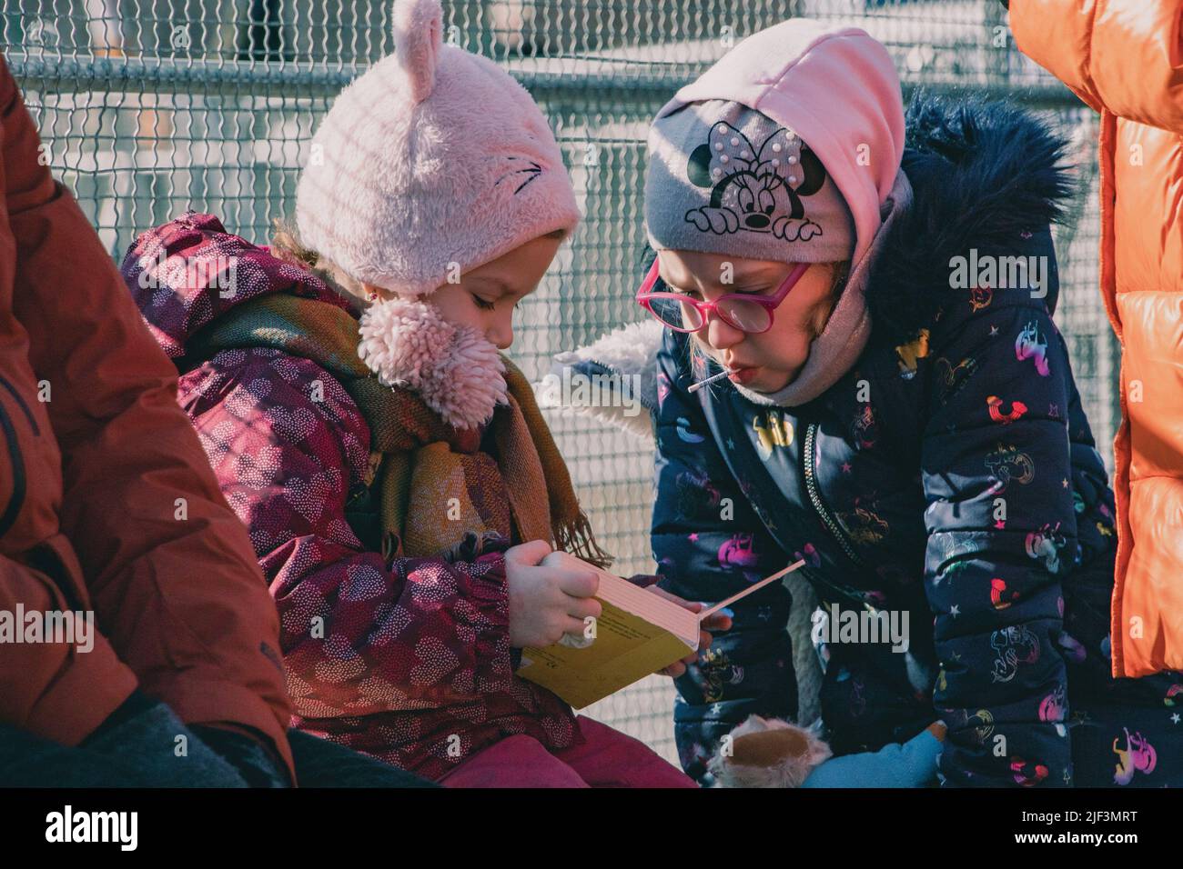 Two Ukrainian children are waiting for the bus. Since the Russian ...