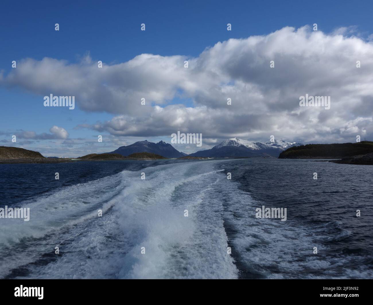 The passenger boat travels between islets and reefs to the next ...