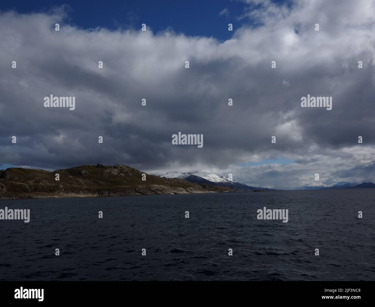 The passenger boat travels between islets and reefs to the next ...