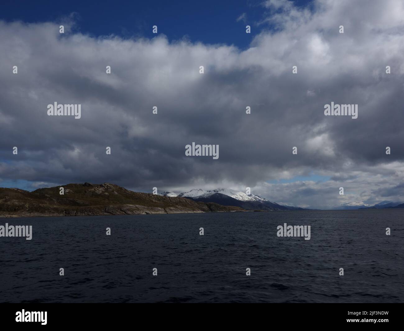The passenger boat travels between islets and reefs to the next ...
