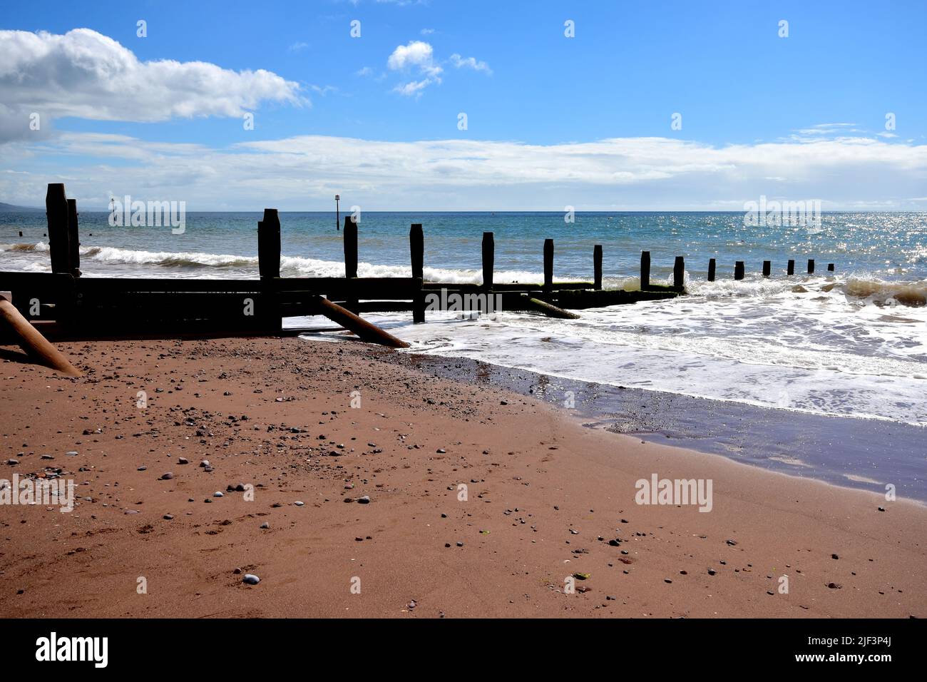 The Groynes on Teignmouth Beach Stock Photo - Alamy