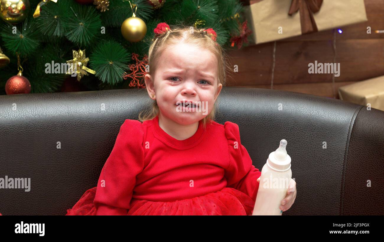 Child crying christmas tree hi-res stock photography and images - Alamy