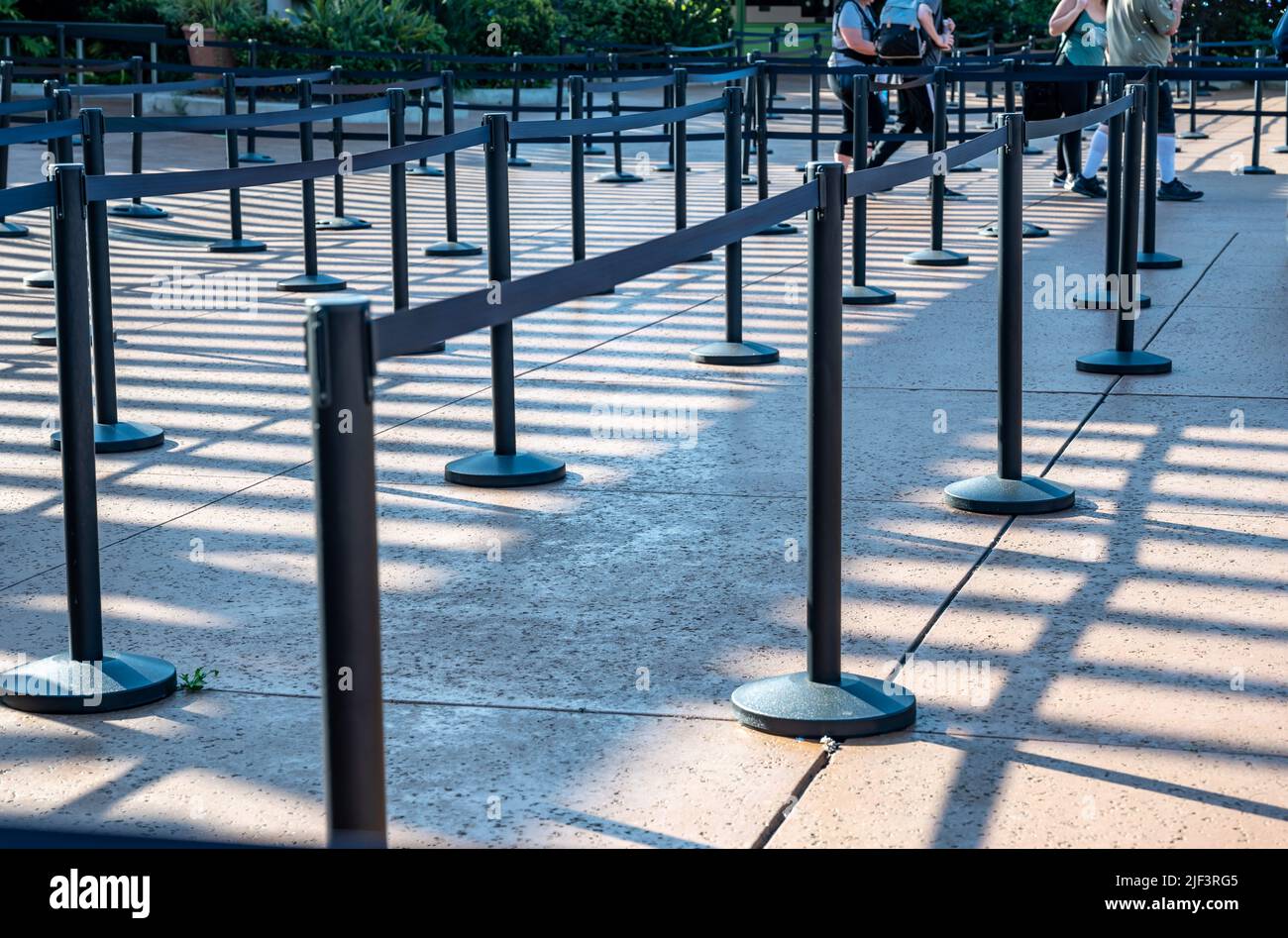 Roped line for crowd control at the entrance of a park Stock Photo - Alamy