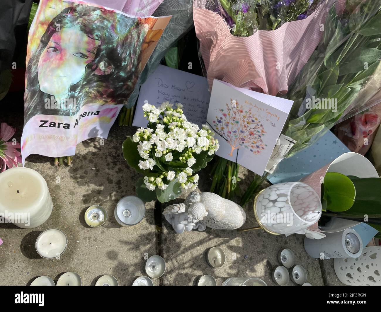 Floral tributes left at the scene on Cranbrook Road in Ilford, east ...