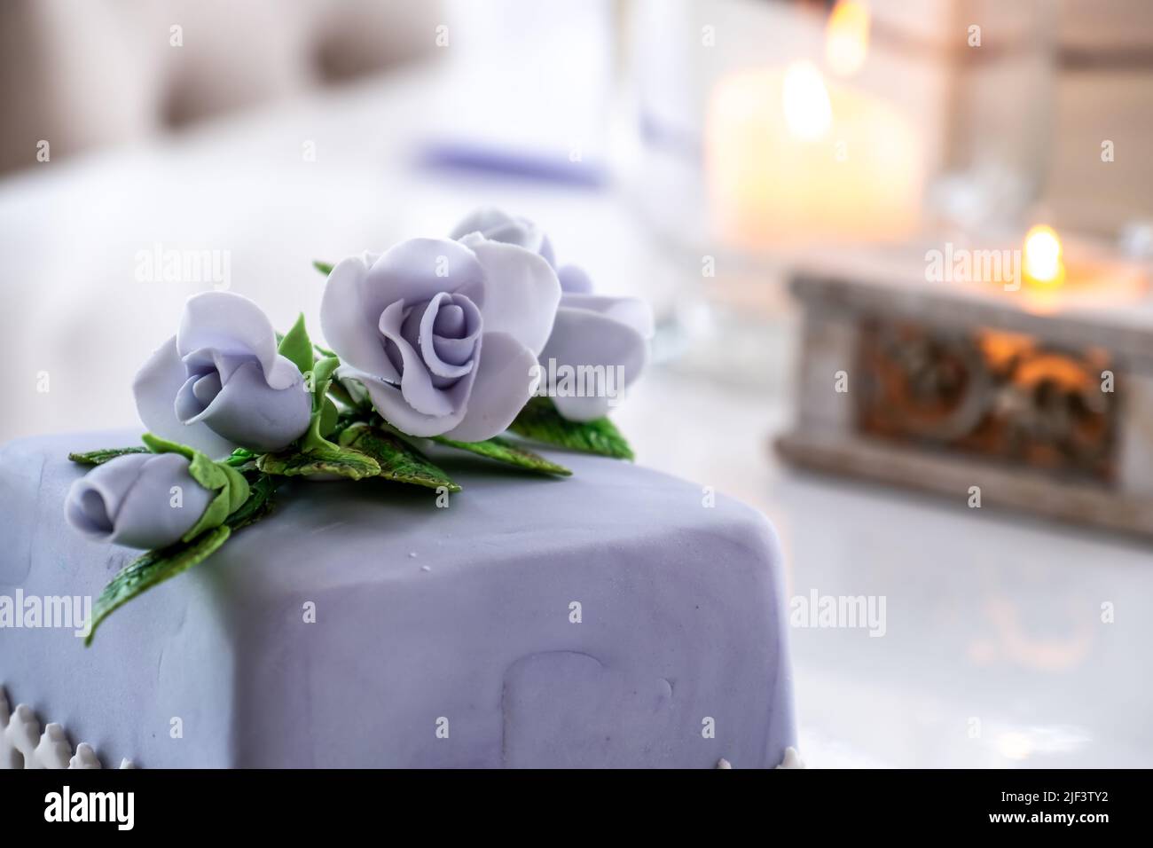Beautiful decorated fruit cake with blue roses Stock Photo - Alamy