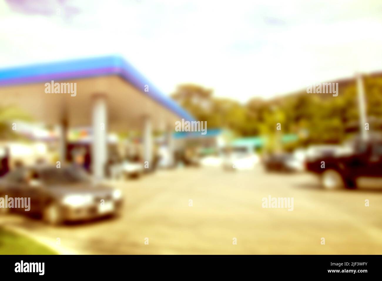 Blurred background of gas station with vintage tone. background for use ...