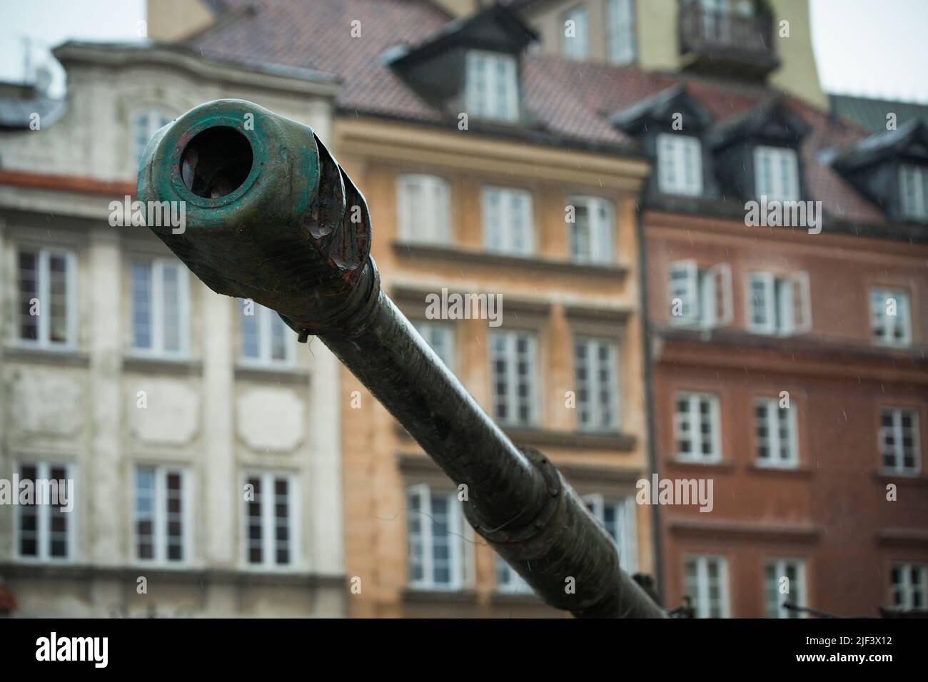 Visitors look at Russian tanks on display near the Royal Castle in ...