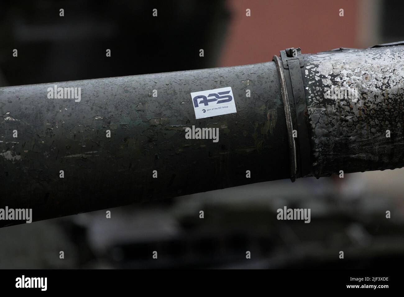 Visitors look at Russian tanks on display near the Royal Castle in ...