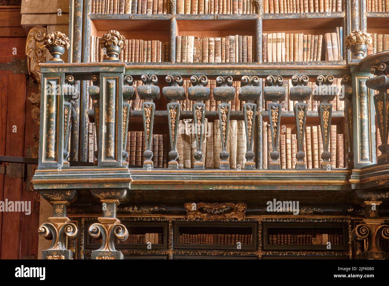 Shelves with old books inside the Biblioteca Joanina, Joanine Library ...