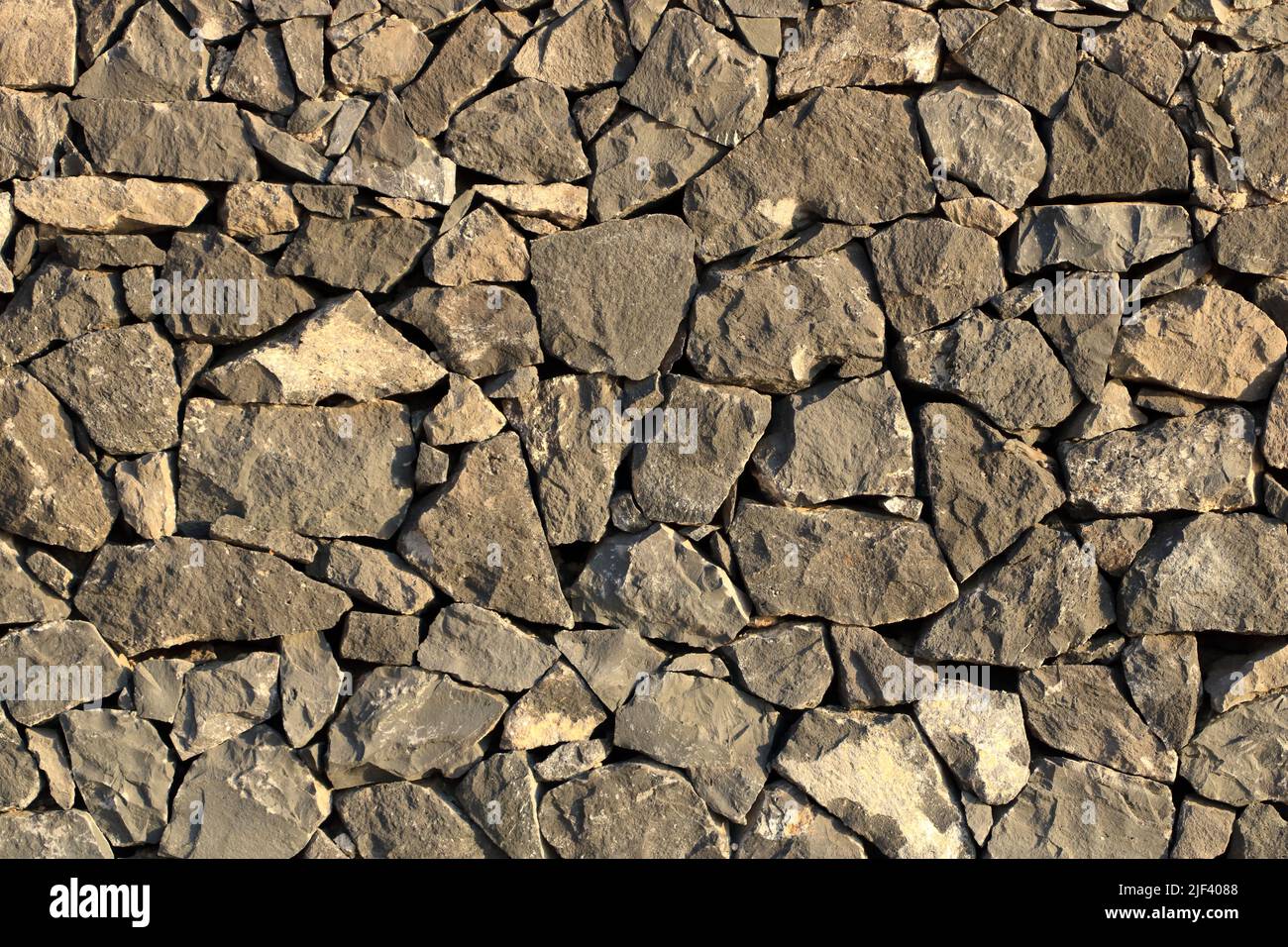 a Gray stone wall texture pattern background Stock Photo - Alamy