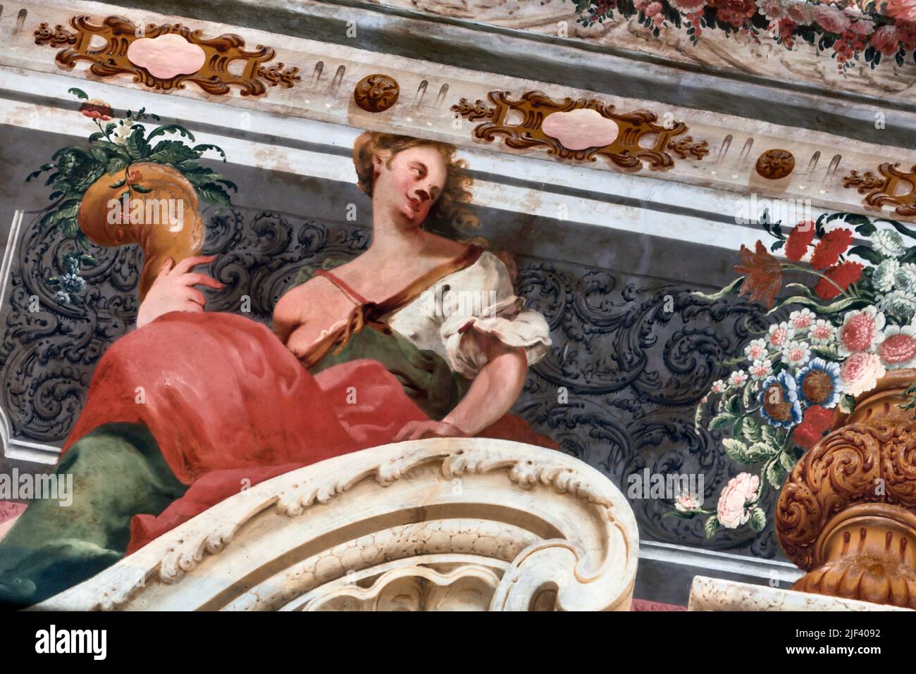 painted ceiling inside the Biblioteca Joanina, Joanine Library in the ...