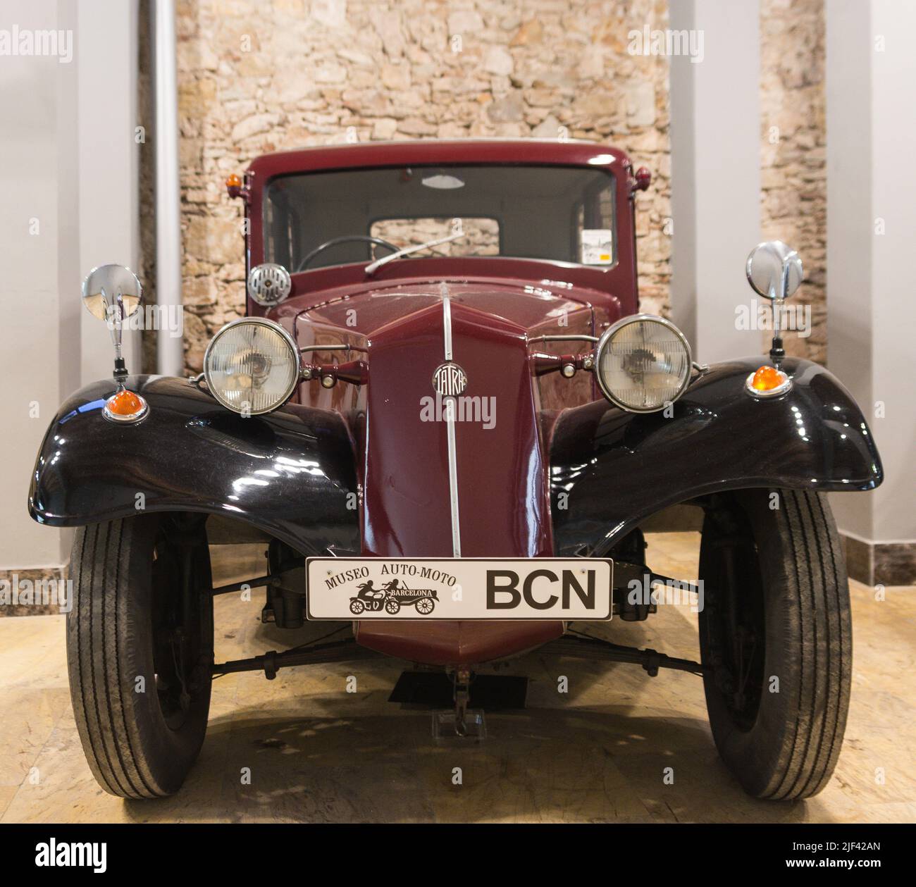 Historical soviet car parked in the museum, bicolor red and black ...