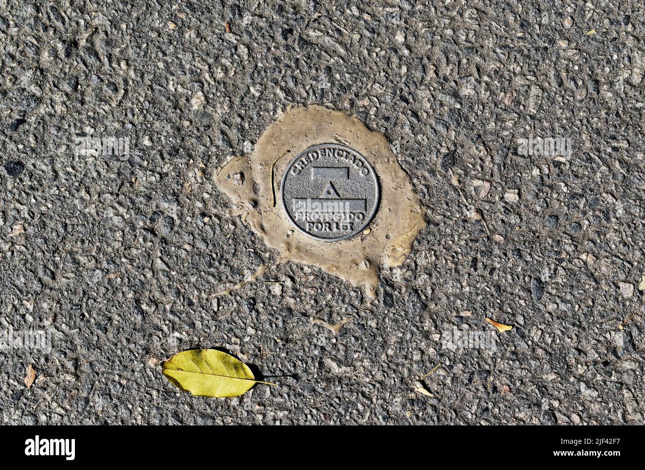 RIO DE JANEIRO, BRAZIL - JUNE 25, 2022: Geodetic mark (sign) on the ...