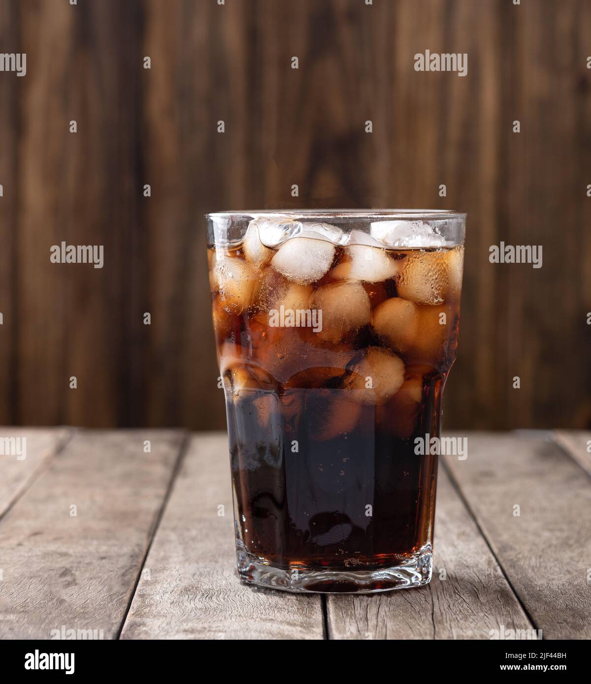 Cola soda, soft drink in cup with ice Stock Photo - Alamy