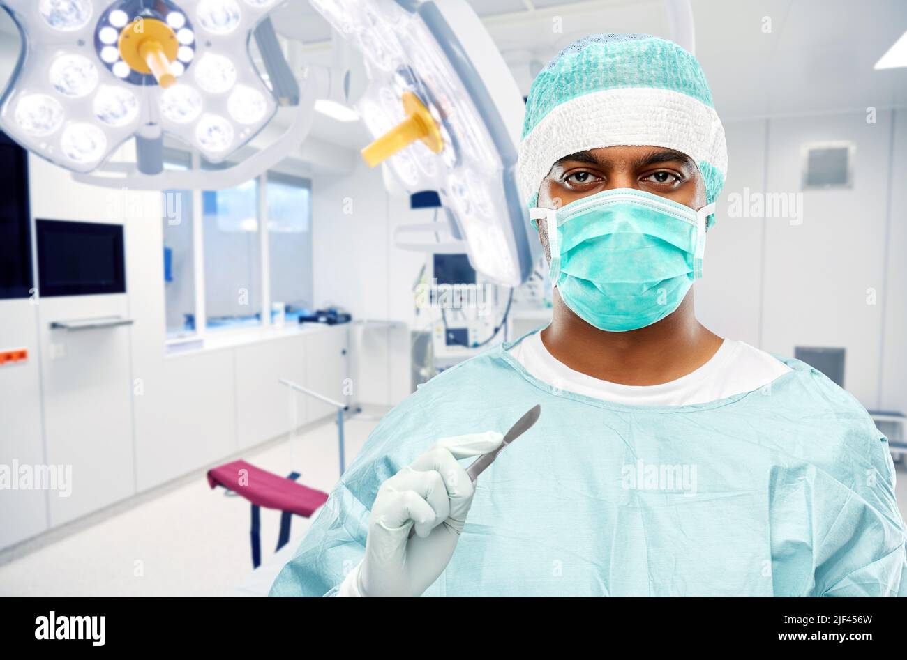 indian surgeon with scalpel over operating room Stock Photo - Alamy