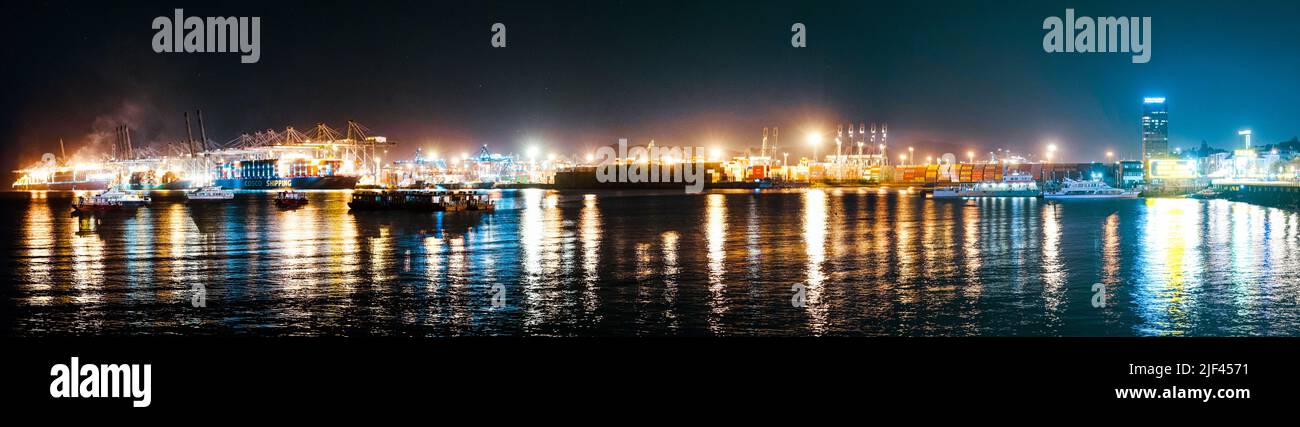 The panoramic view of the port with ships at night Stock Photo - Alamy