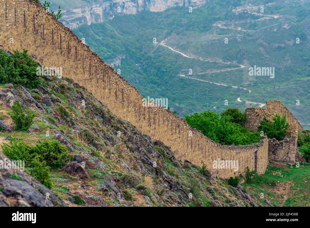 medieval fortress wall on a mountain slope, Gunib (Shamil) fortress in ...