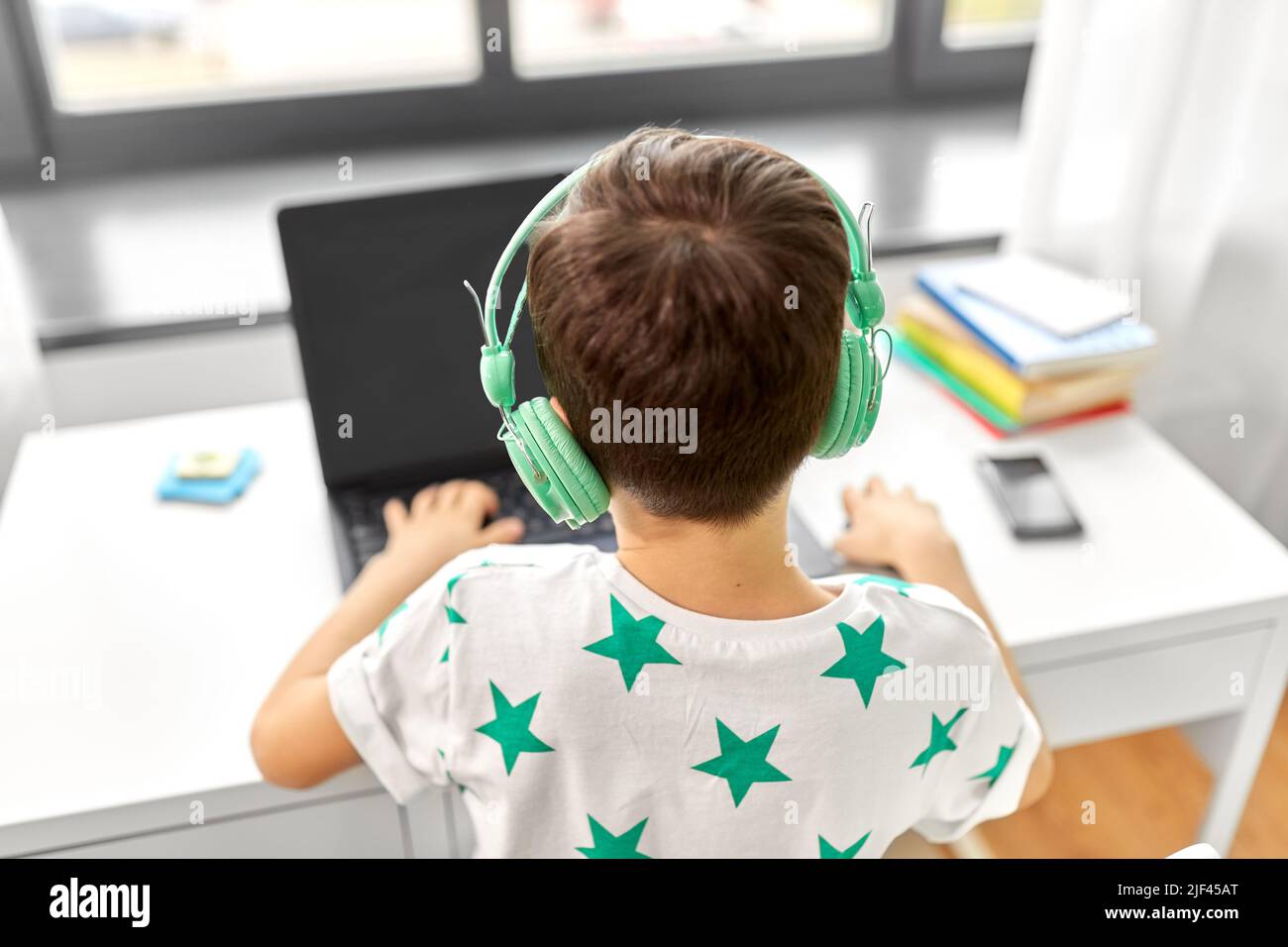 Boy computer rear view hi-res stock photography and images - Alamy