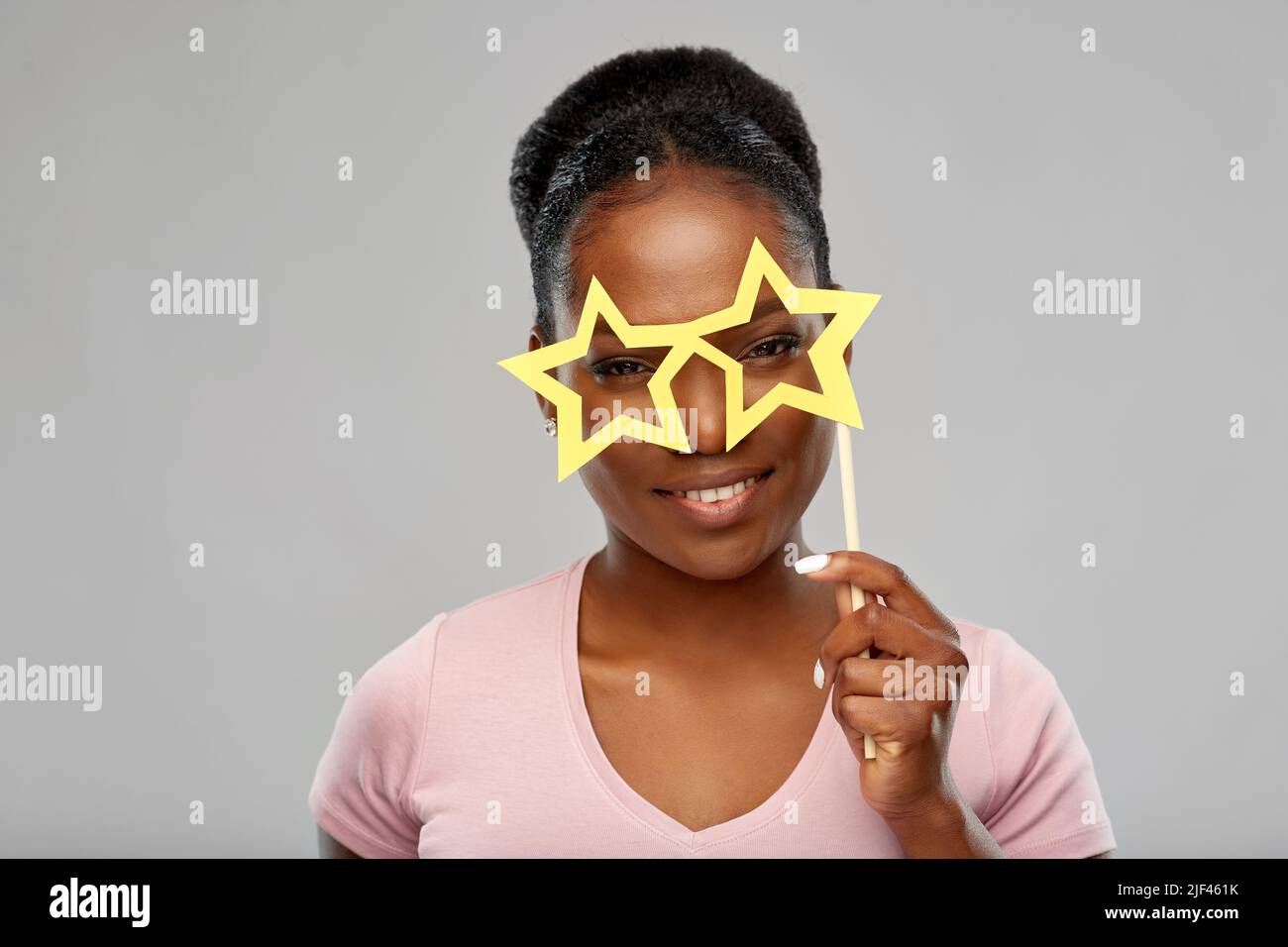 african american woman with star shaped glasses Stock Photo - Alamy