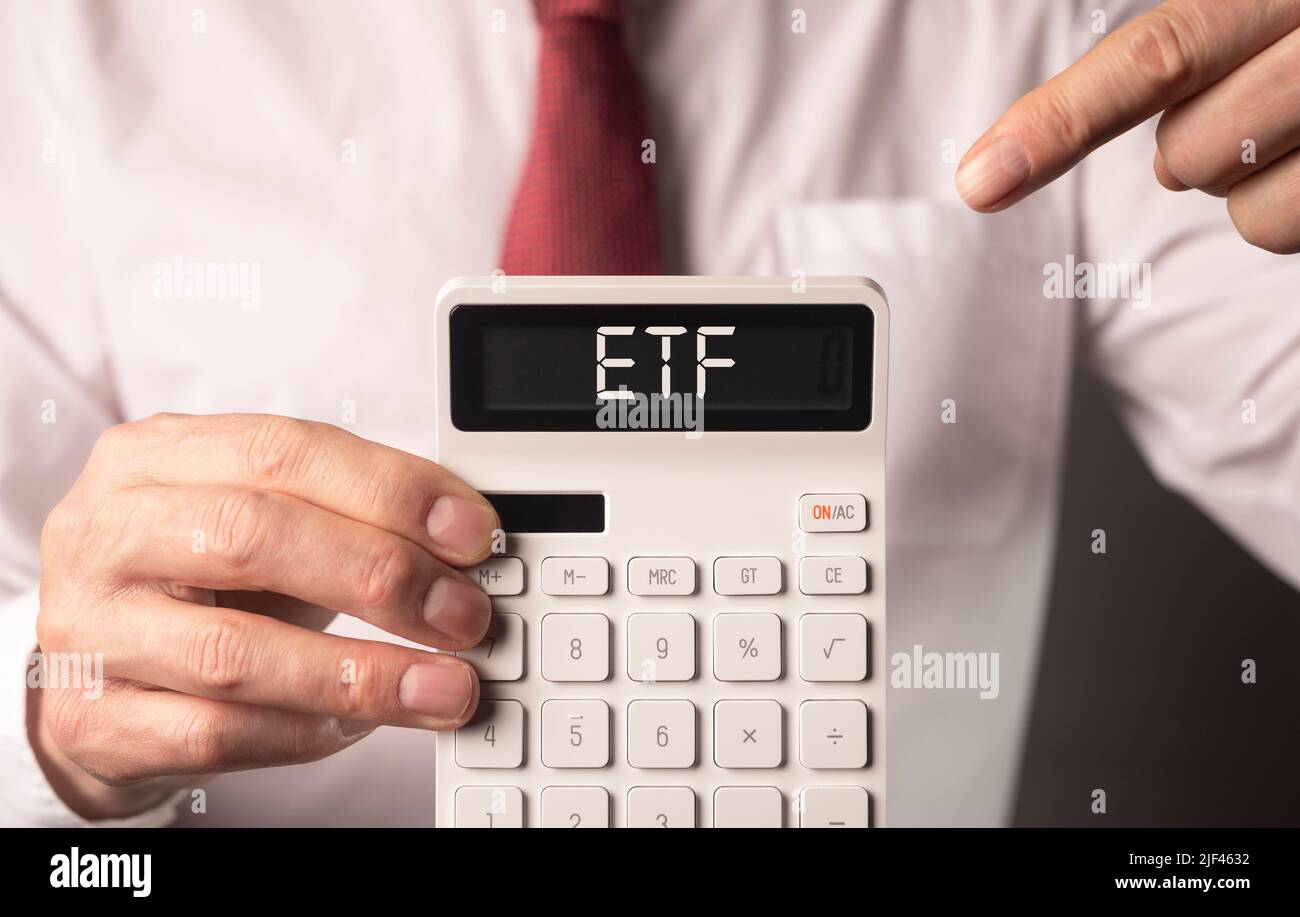 ETF analysis concept. Word on calculator. High quality photo Stock ...