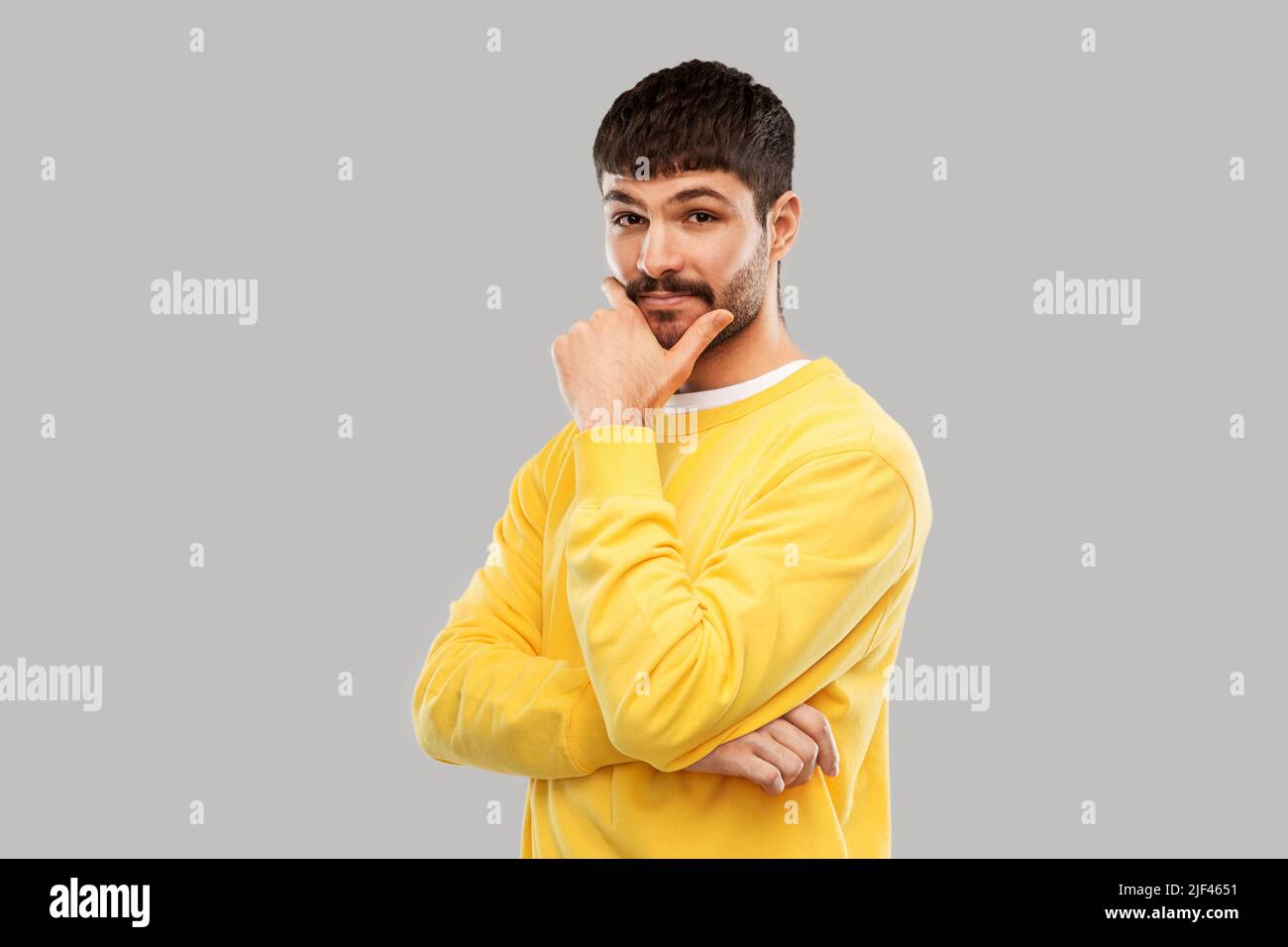 Thinking solution serious young hi-res stock photography and images - Alamy