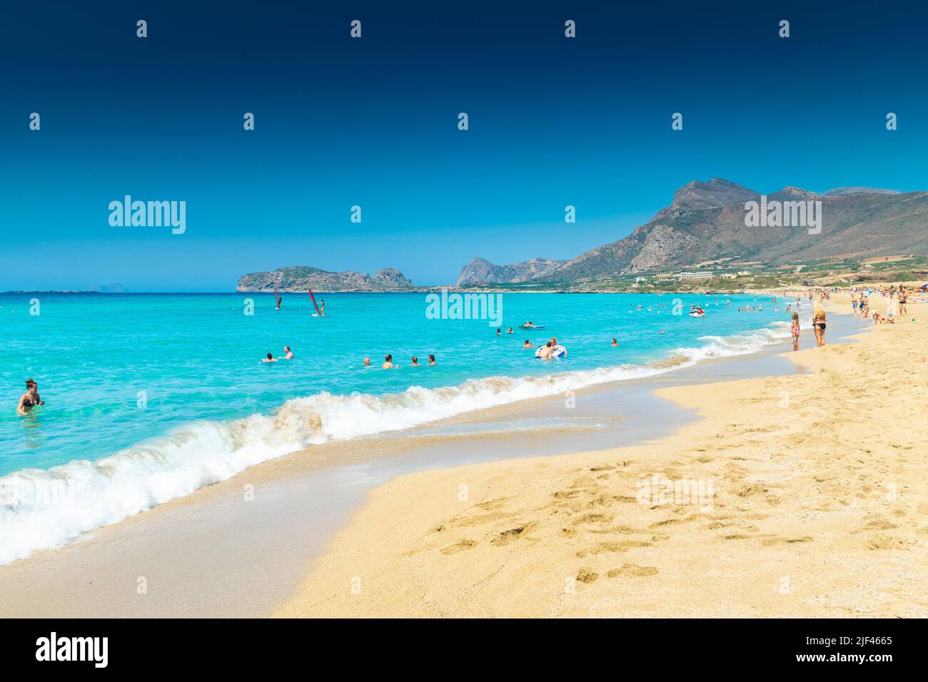 Falassarna, Greece, 13 June 2022: Tourists on the sandy beach of ...