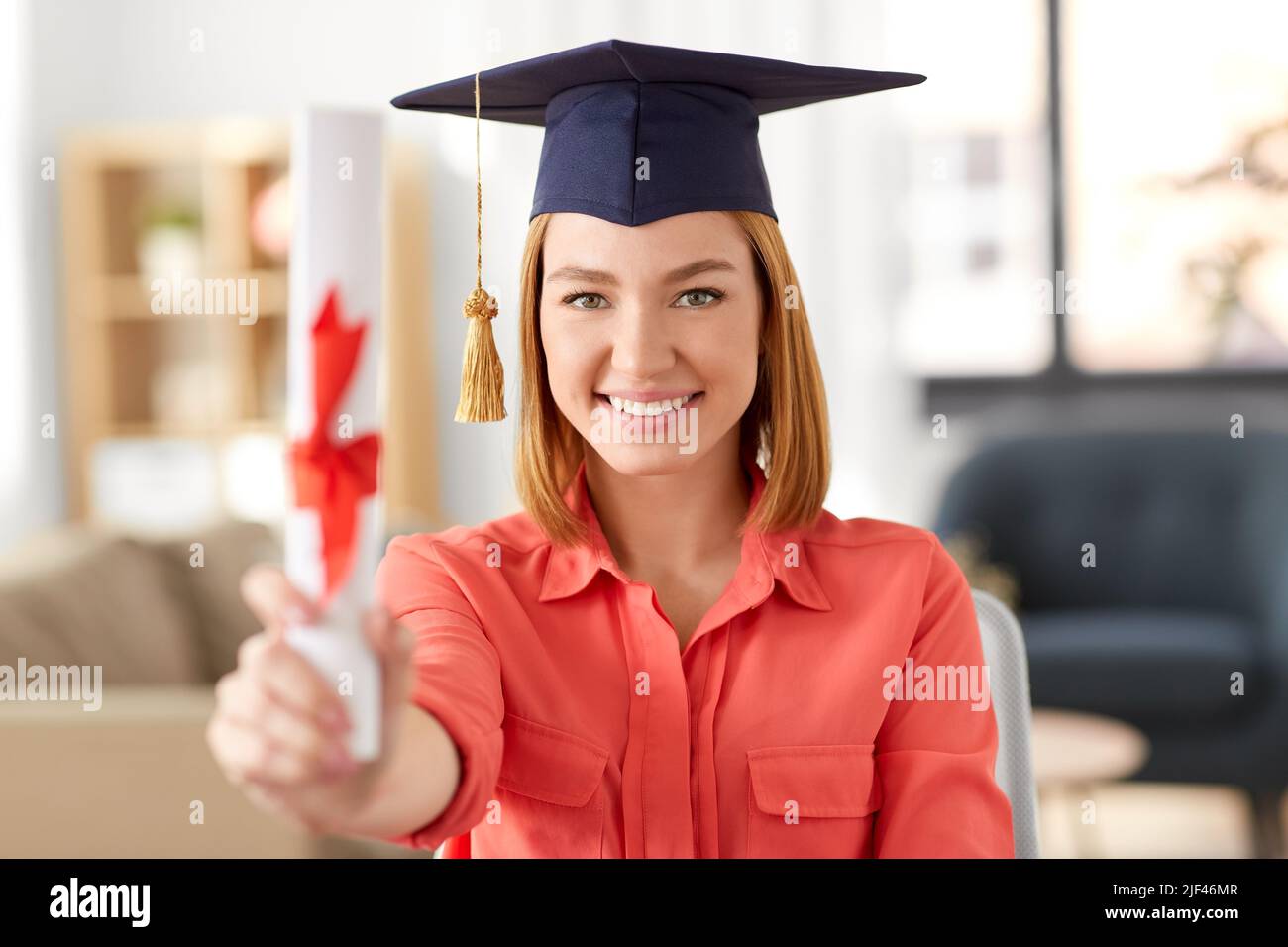 Happy graduate student diploma sitting hi-res stock photography and ...