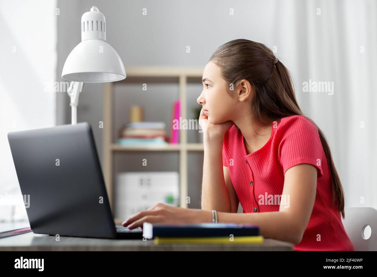 student girl with laptop computer learning at home Stock Photo - Alamy