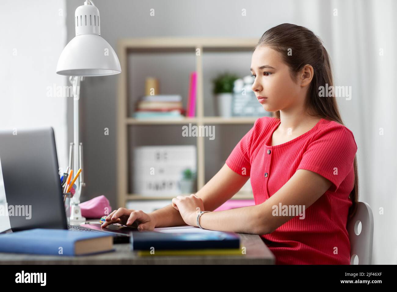 student girl with laptop computer learning at home Stock Photo - Alamy
