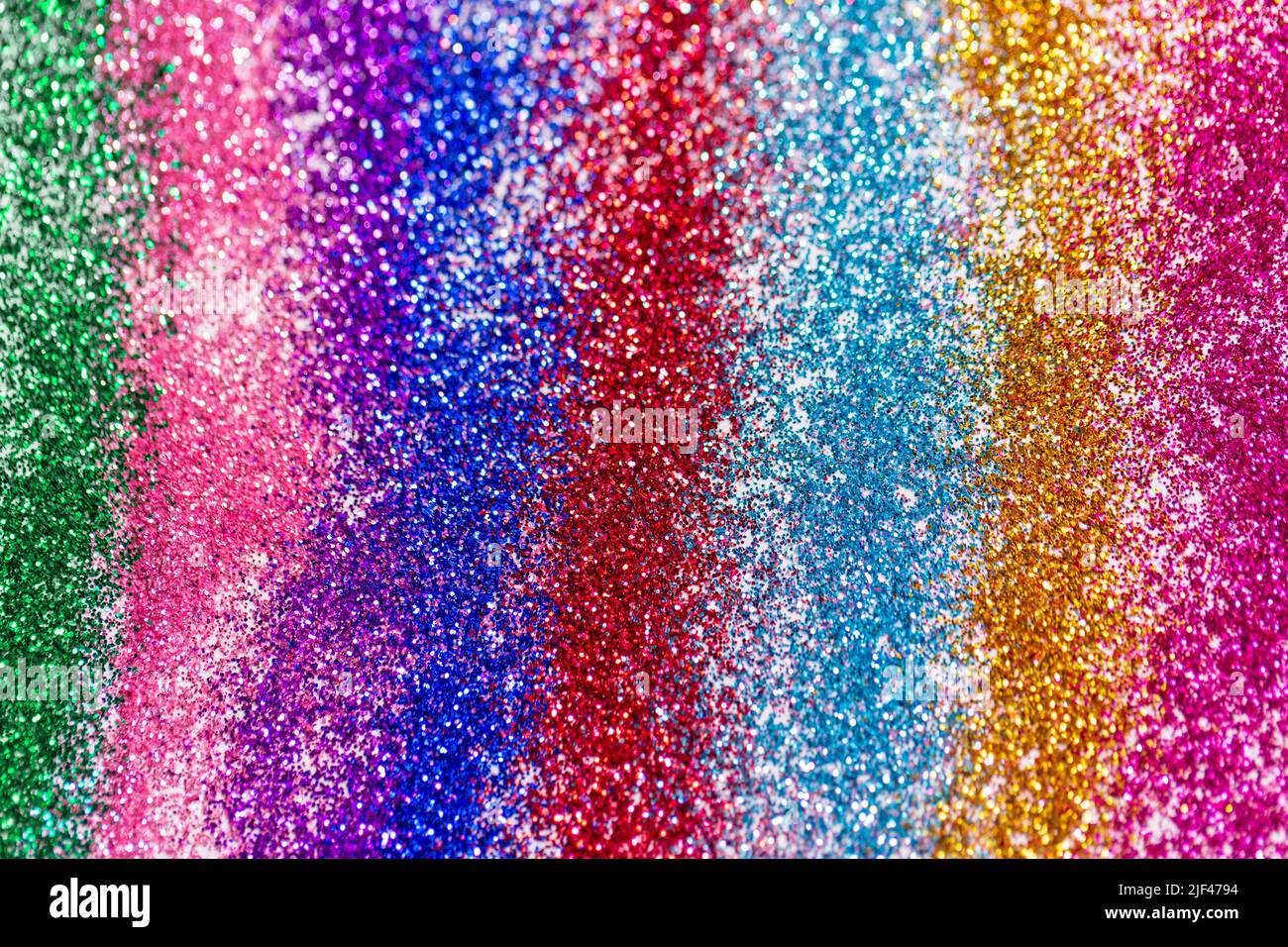 multicolored glitters or sequins background Stock Photo - Alamy