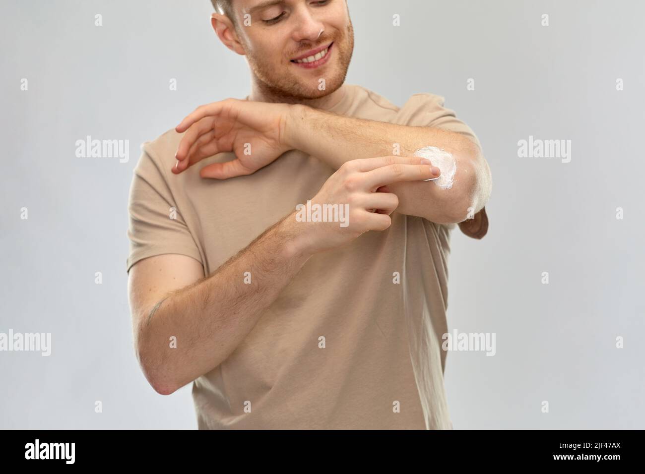 Man applying salve hi-res stock photography and images - Alamy