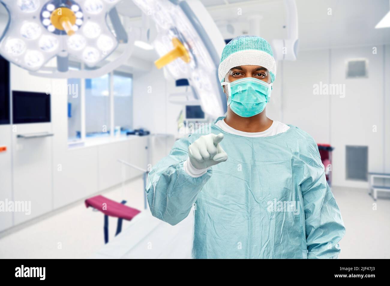 indian male doctor or surgeon over operating room Stock Photo - Alamy