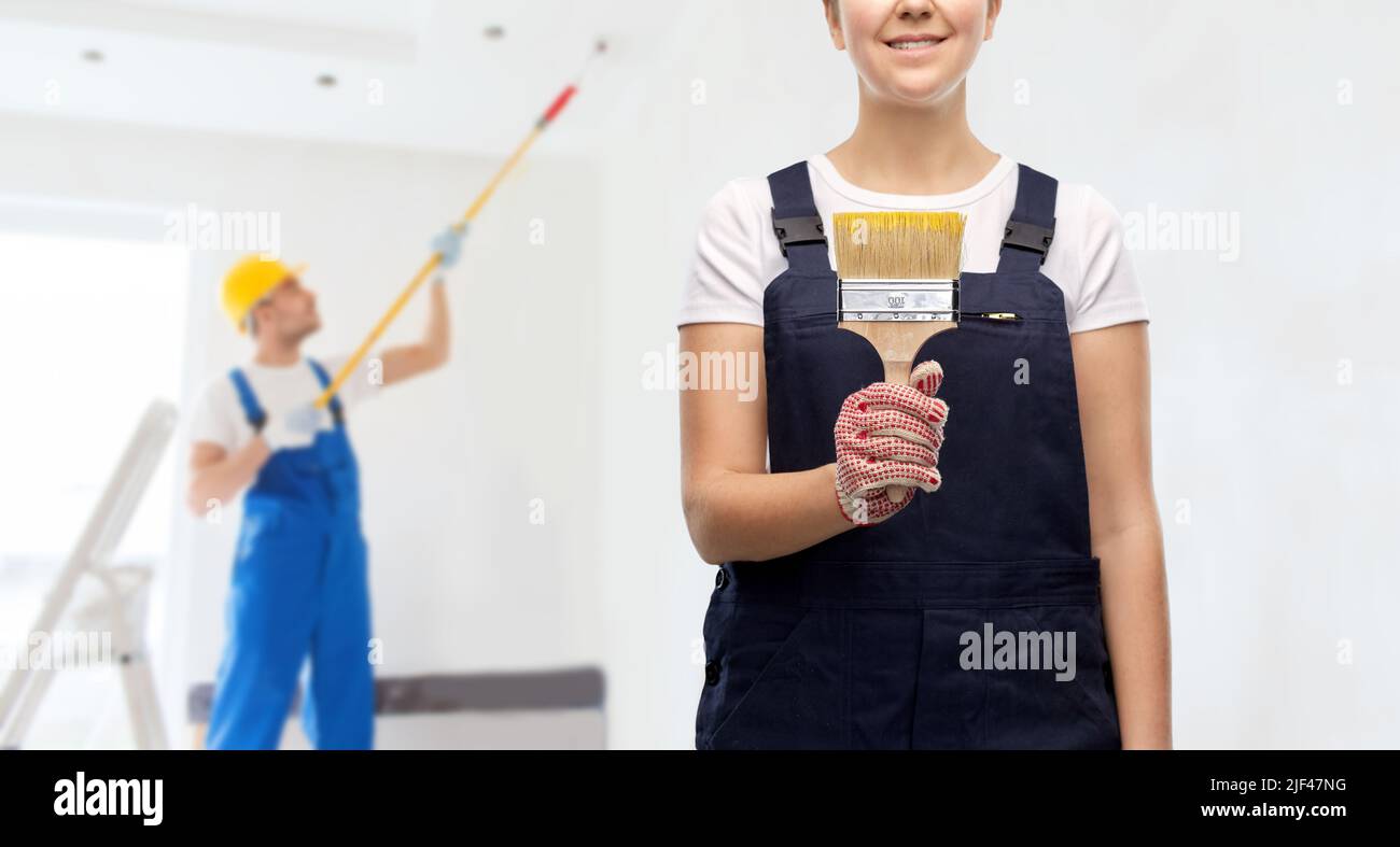 Female house painter brush hi-res stock photography and images - Alamy