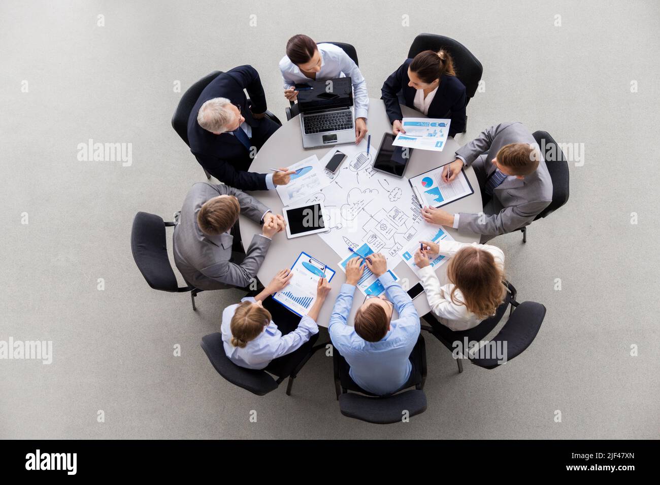 business team with scheme meeting at office Stock Photo - Alamy