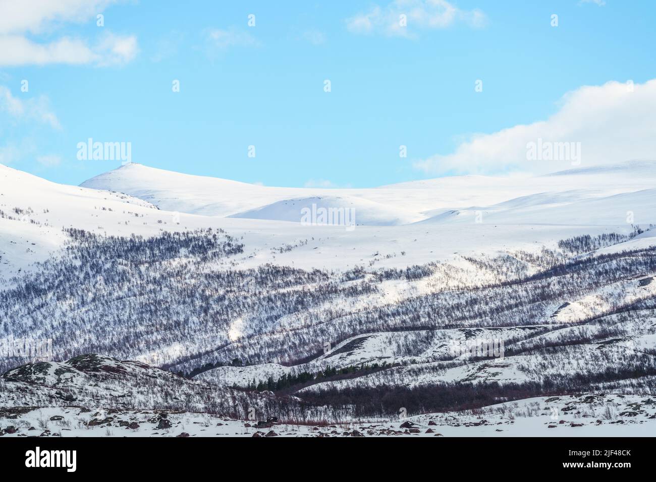 Winter landscape with high mountains with snow and sunny weather in ...