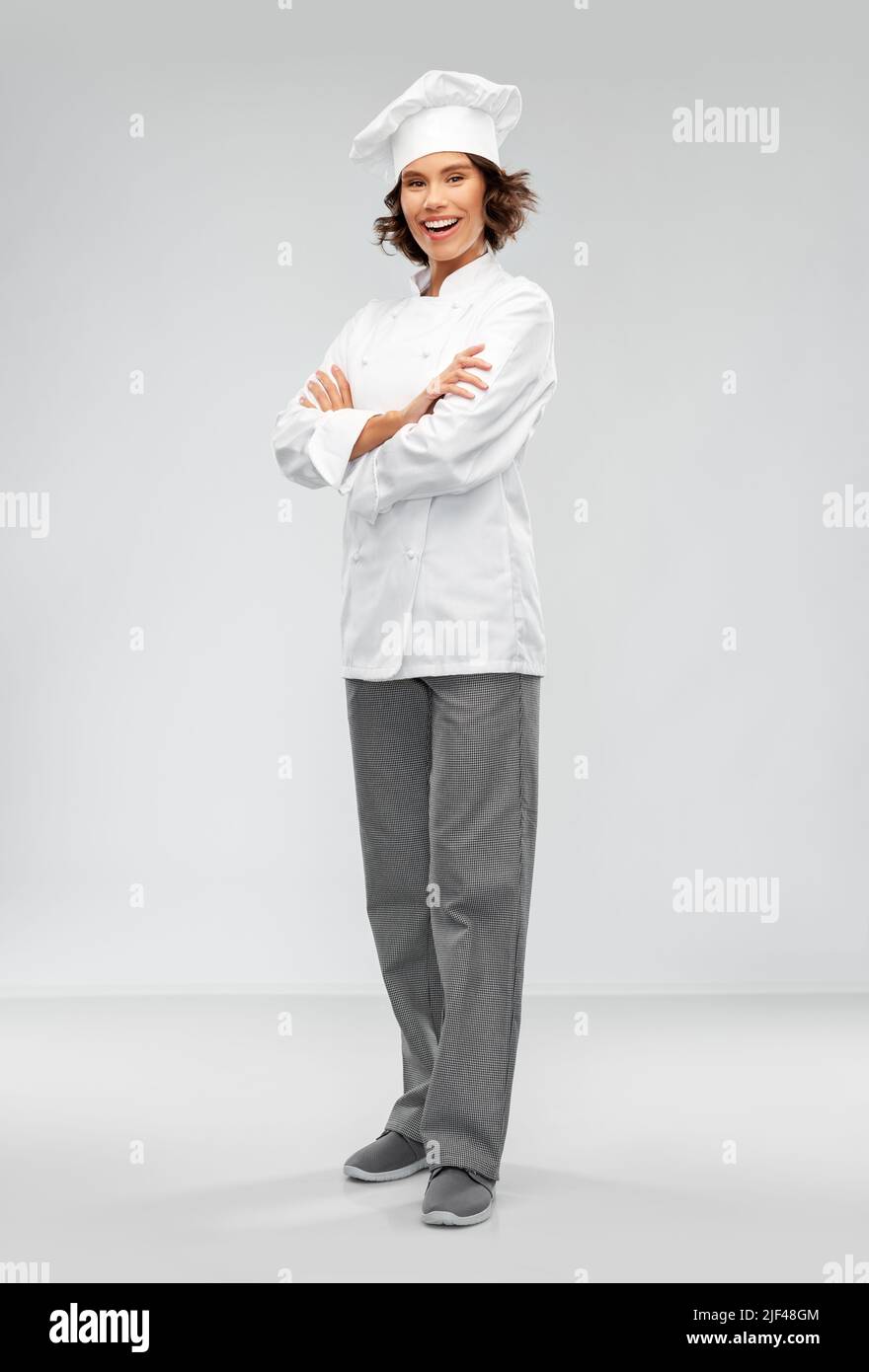 smiling female chef in toque Stock Photo - Alamy