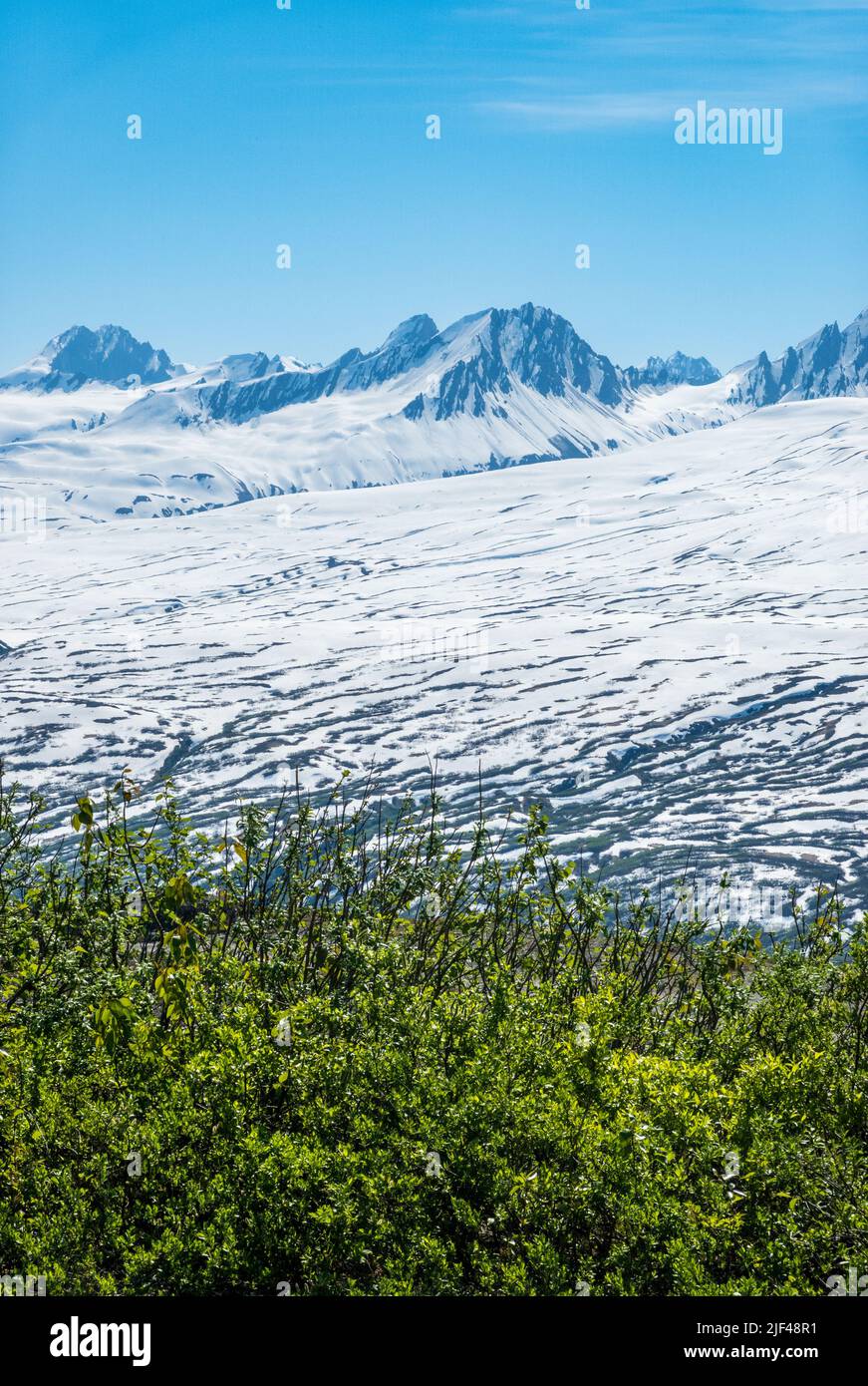Vertical format view of majestic mountains of Thompson Pass near Valdez ...