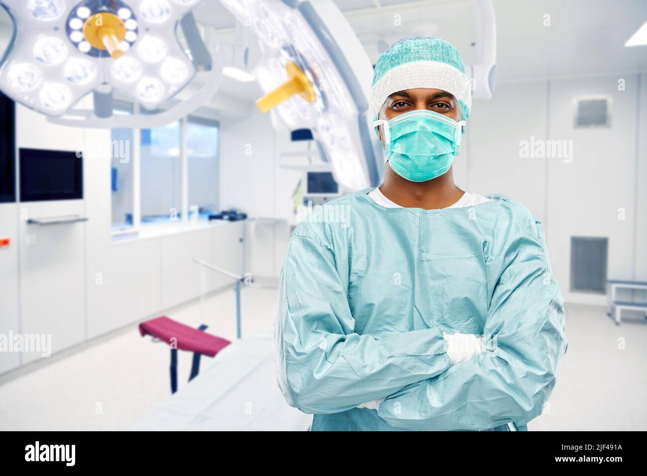 indian male doctor or surgeon over operating room Stock Photo - Alamy