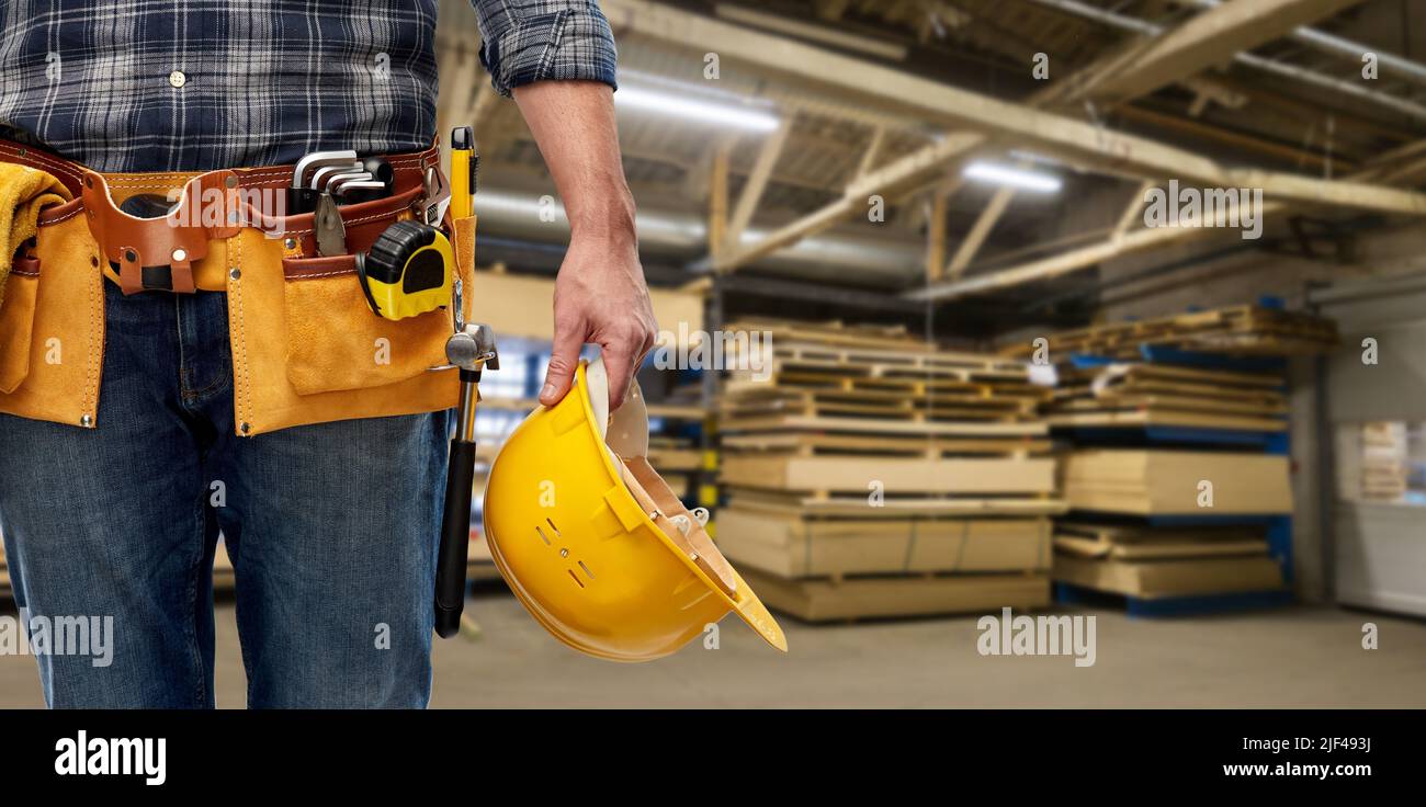 male worker with helmet and working tools Stock Photo - Alamy