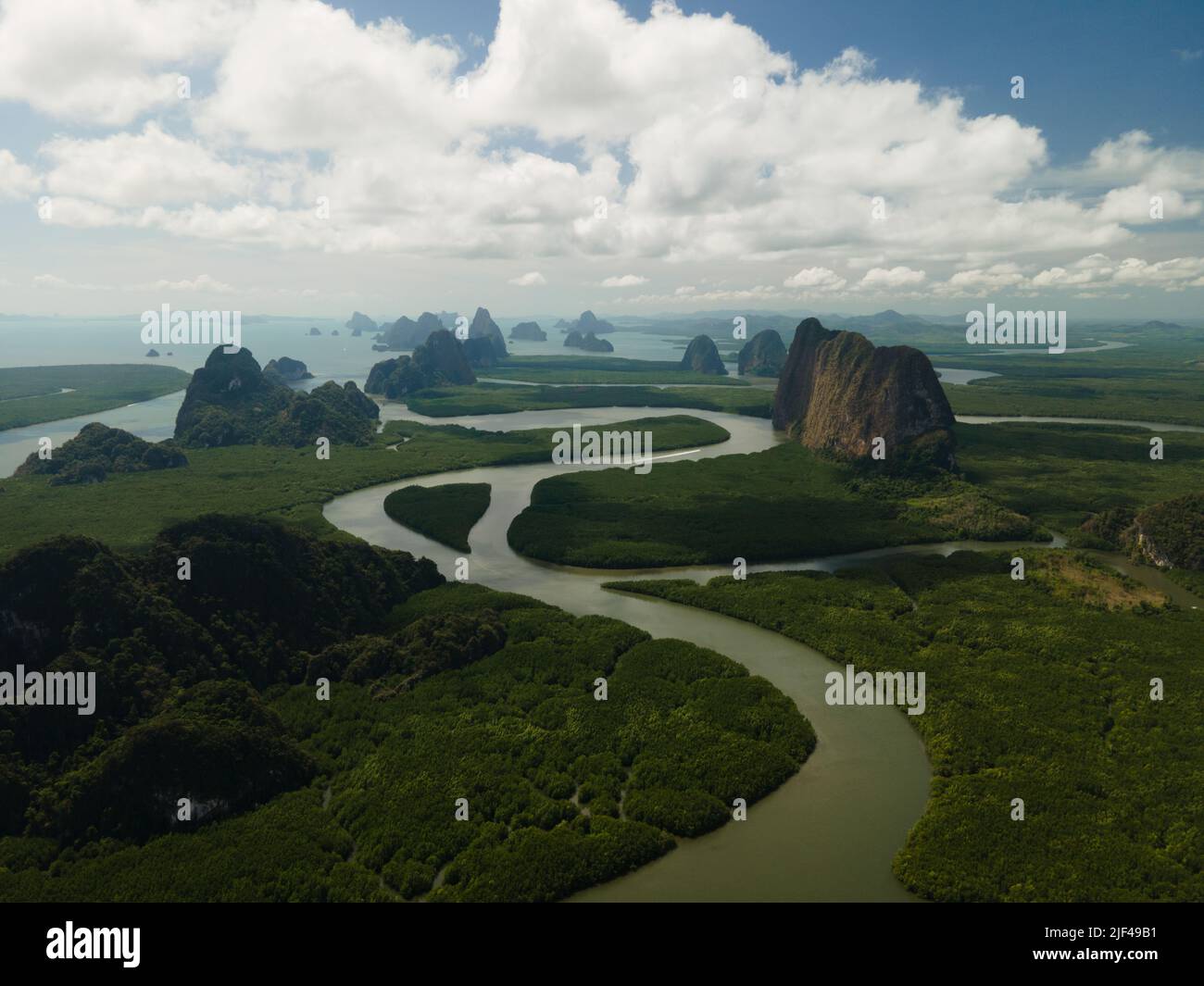 Aerial view of a swerving river through a series of limestones in Phang ...