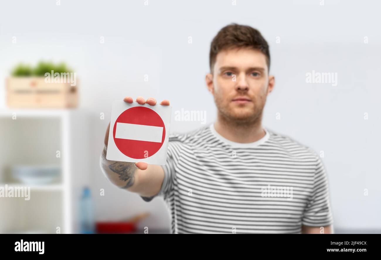 Serious man warning sign hi-res stock photography and images - Alamy