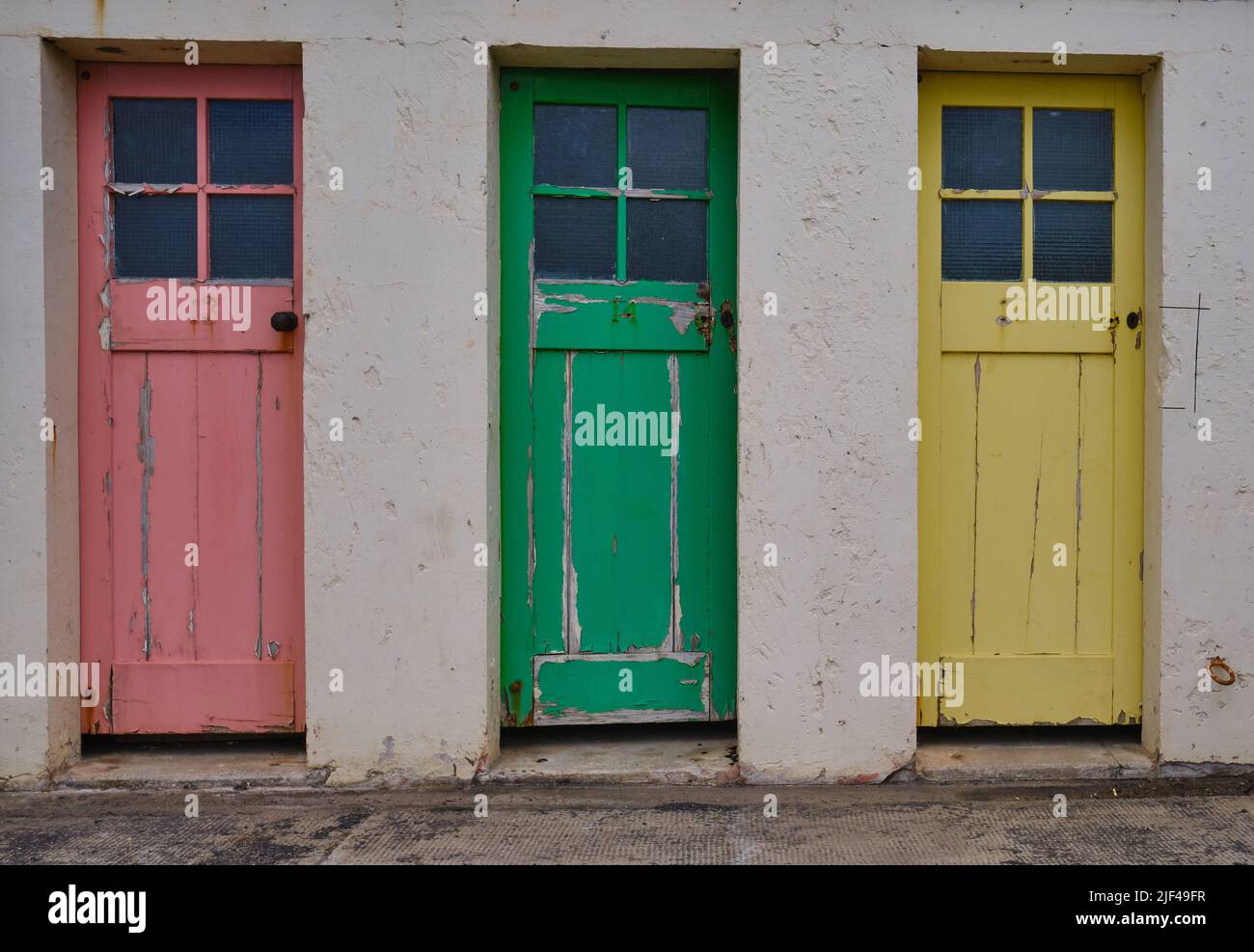 Row of doors hi-res stock photography and images - Alamy