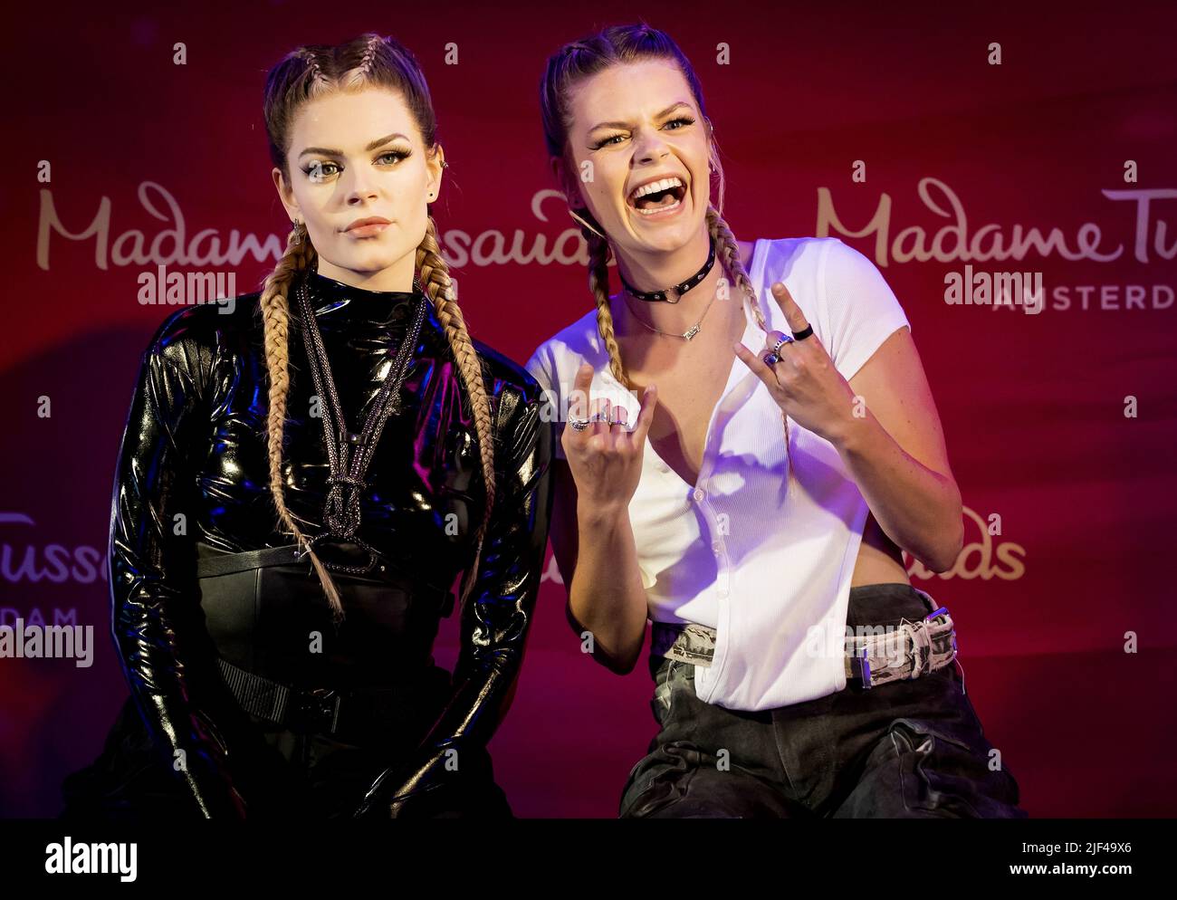 2022-06-29 16:05:23 AMSTERDAM - Singer Davina Michelle poses next to ...