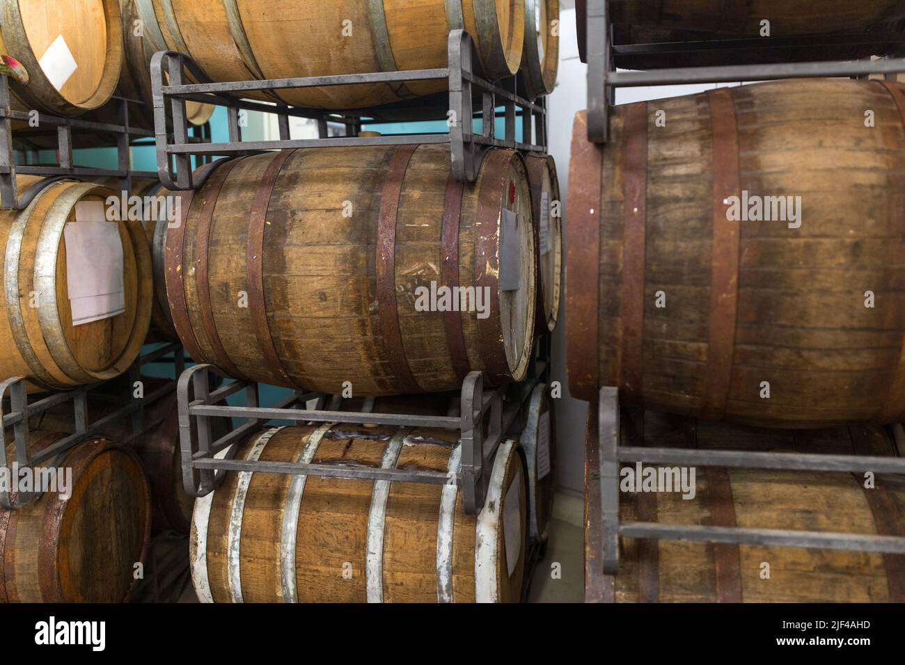 wooden barrels at craft brewery or winery Stock Photo - Alamy