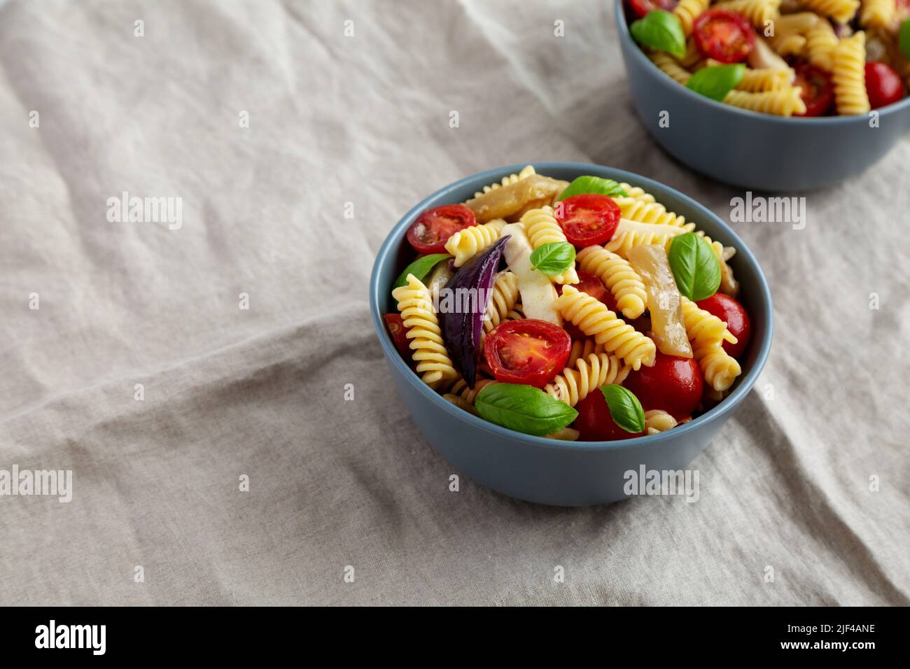 Homemade Fusilli Pasta Salad with Mozzarella and Vegetables, side view ...