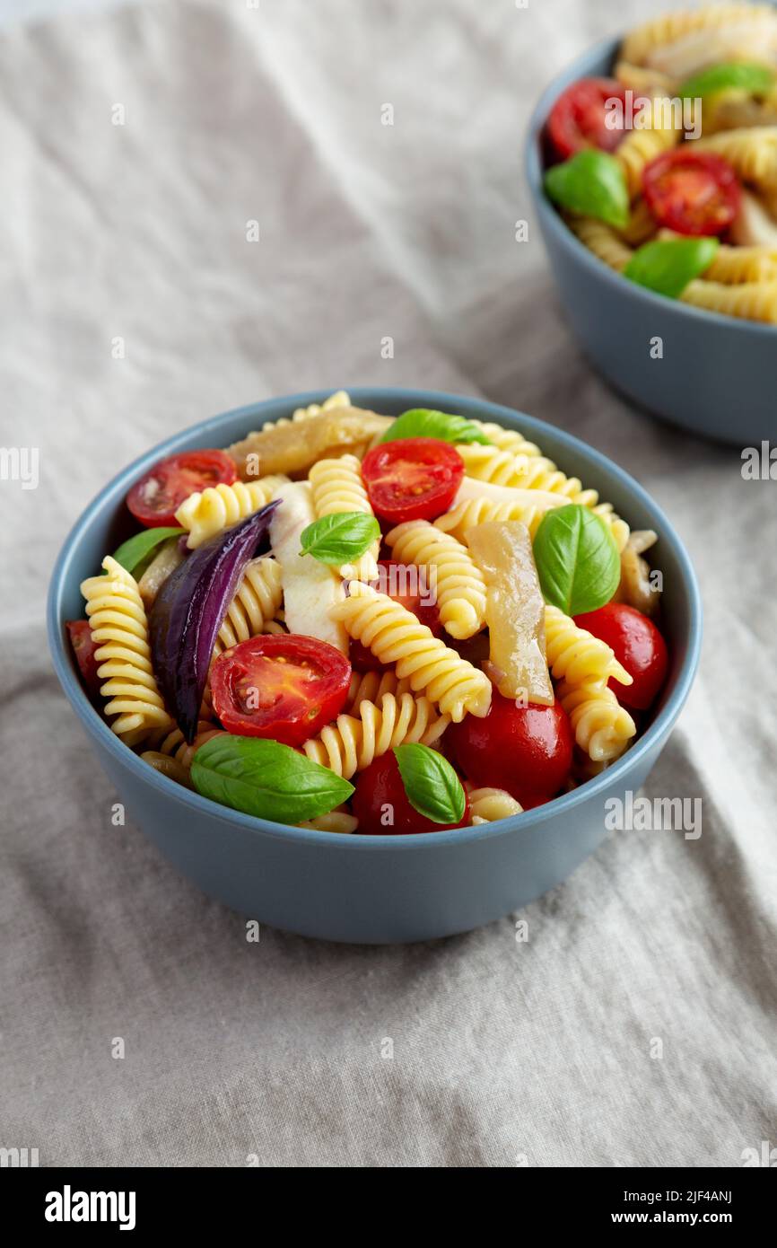 Homemade Fusilli Pasta Salad with Mozzarella and Vegetables, side view ...