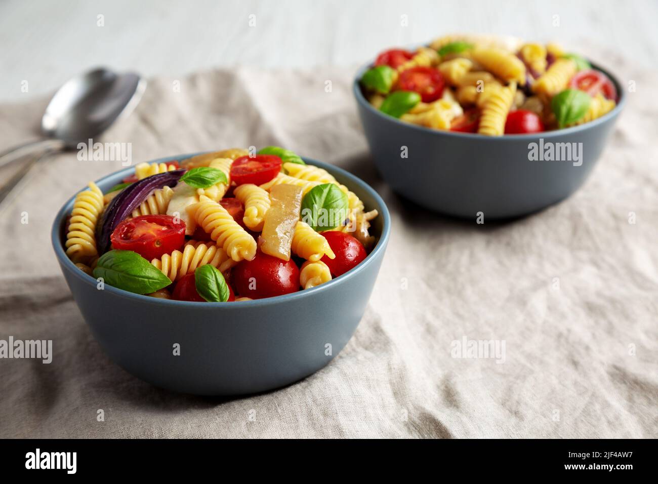 Homemade Fusilli Pasta Salad with Mozzarella and Vegetables, low angle ...