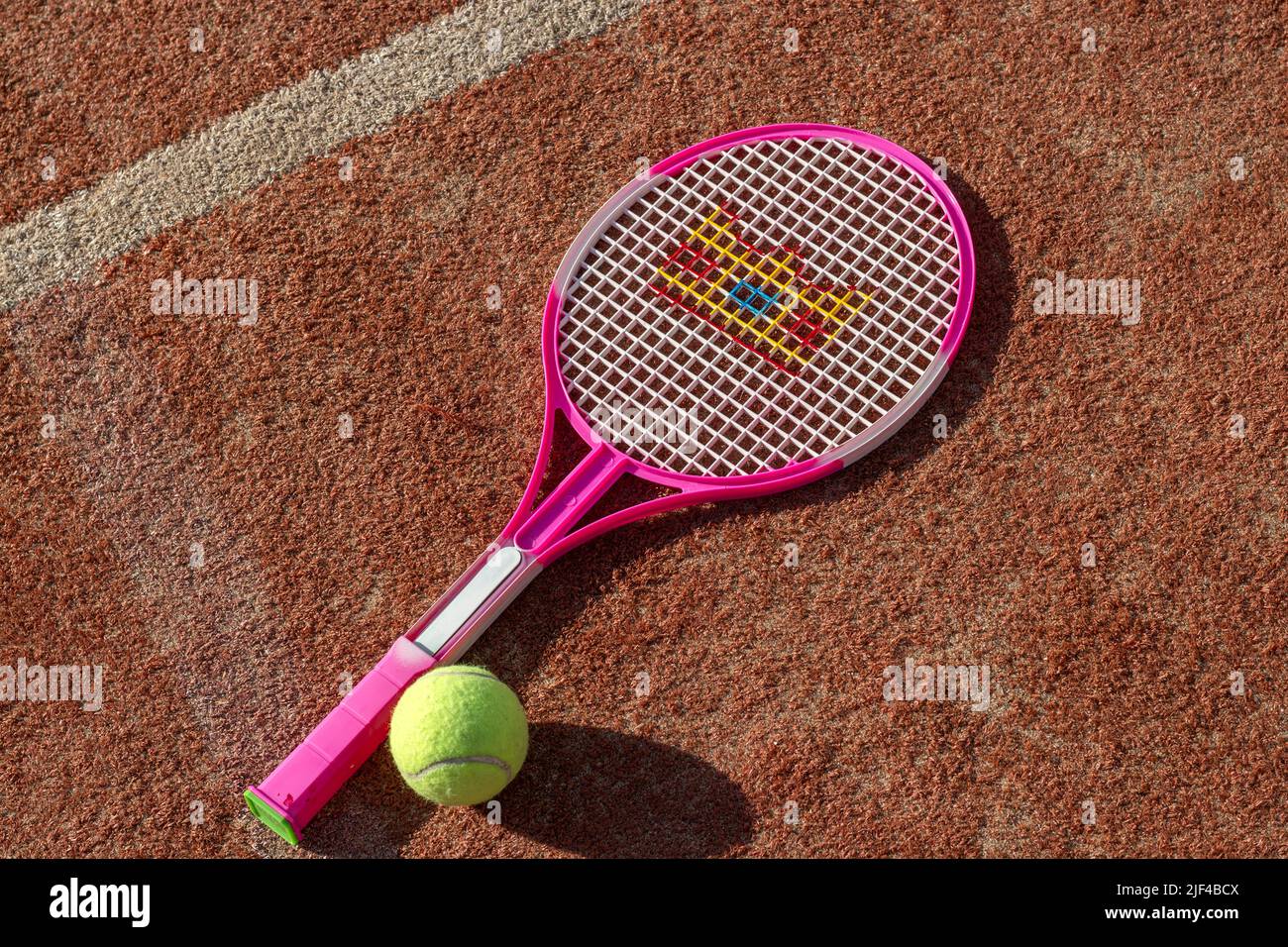 Tennis game. Tennis ball with racket on the tennis court. The concept ...